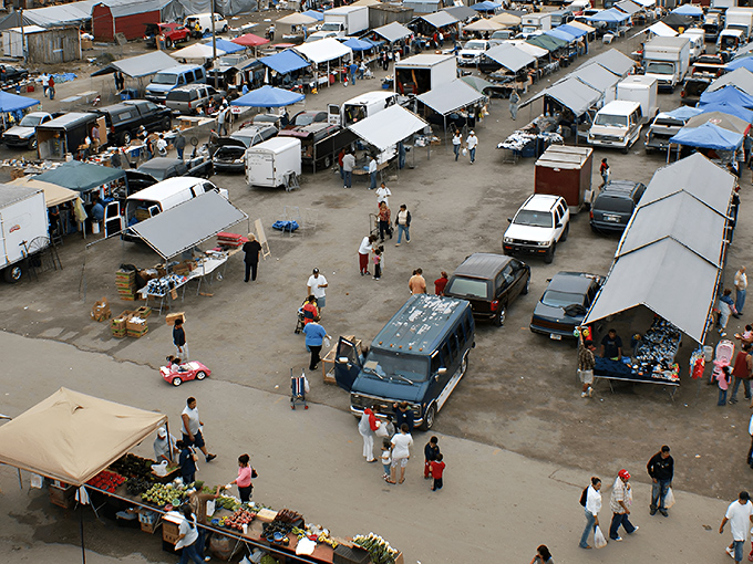Treasure hunters navigate the bustling aisles of Plant City's weekend wonderland. The thrill of discovery hangs in the air like Florida humidity&mdash;inescapable and oddly energizing.
