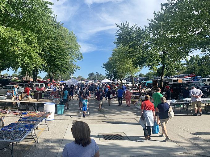 The weekend pilgrimage begins! Shoppers navigate this asphalt treasure map where one person's castoffs become another's must-haves. 