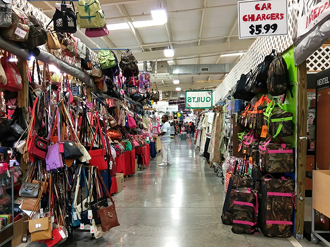 Tennessee pride flies overhead as treasure hunters browse tables laden with local goods, homemade treats, and unexpected finds.