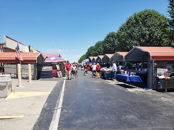 The outdoor section at Great Smokies Flea Market is where treasure hunting begins&mdash;colorful umbrellas shield vintage furniture and collectibles from the Tennessee sun.