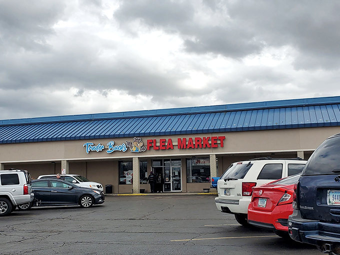 The blue-roofed bargain kingdom beckons with its neon promise of treasures waiting to be discovered inside.