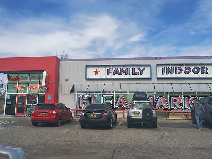 The red and white fa&ccedil;ade of Family Indoor Flea Market stands like a beacon for treasure hunters. Bargain paradise awaits behind those doors!
