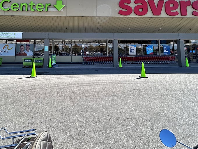 The thrill of the hunt begins at this unassuming storefront, where those iconic red carts await their destiny as treasure vessels.