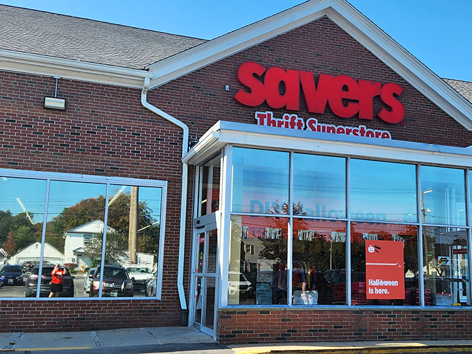 The Savers storefront at dusk, where budget dreams take flight alongside that airplane in the background. Treasure hunting season is always open here.