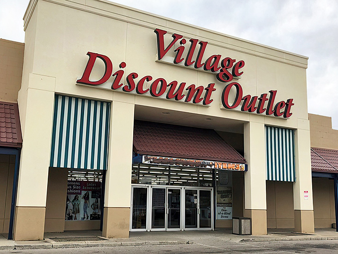 The bold red letters beckon like a siren song to bargain hunters everywhere &ndash; Village Discount Outlet isn't just a store, it's a treasure-hunting expedition waiting to happen.
