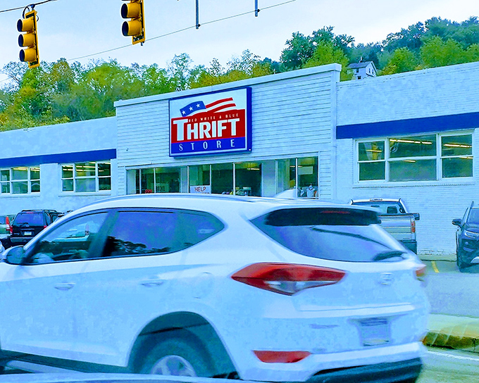 The patriotic facade of Red White And Blue Thrift Store beckons bargain hunters like a siren song for the fiscally responsible.