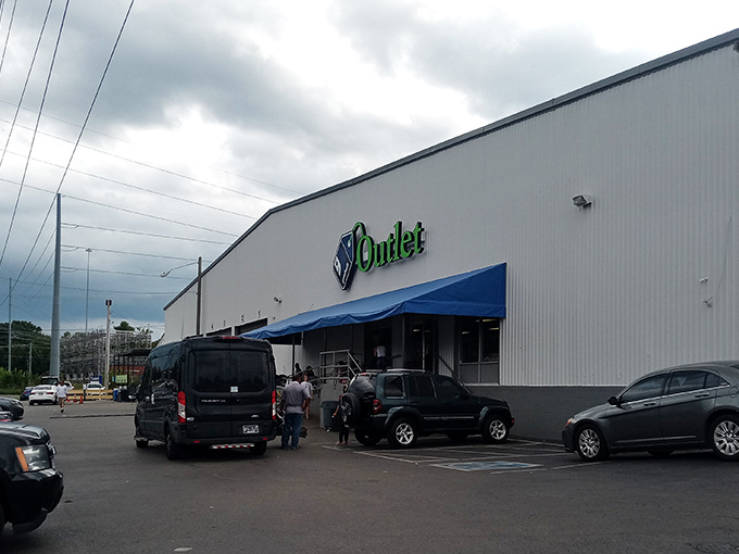 The unassuming exterior of Goodwill's Donation Express hides a treasure hunter's paradise within. Blue skies above seem to promise blue bin adventures ahead! 