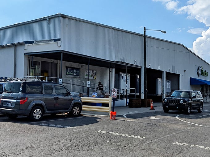 The unassuming exterior of Goodwill's Donation Express hides a treasure hunter's paradise within. Blue skies above seem to promise blue bin adventures ahead! 