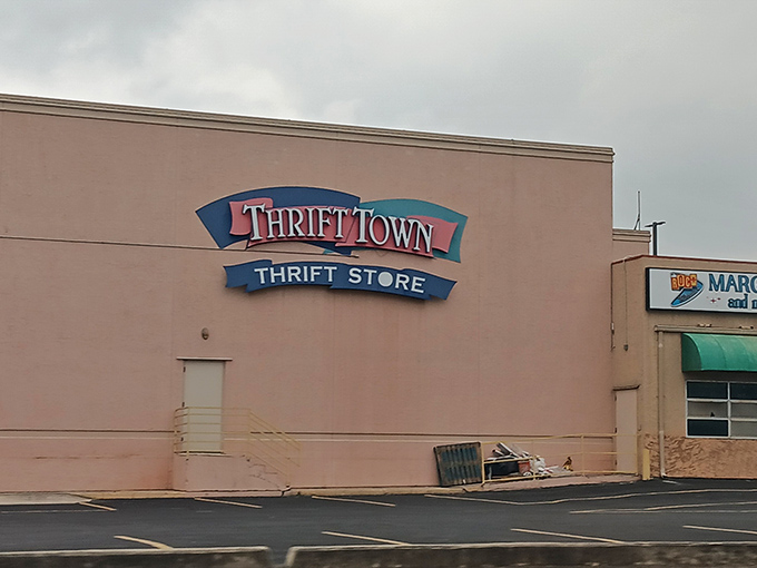 The unassuming exterior of Thrift Town belies the wonderland within, like a treasure chest disguised as a shoebox. Bargain magic awaits!