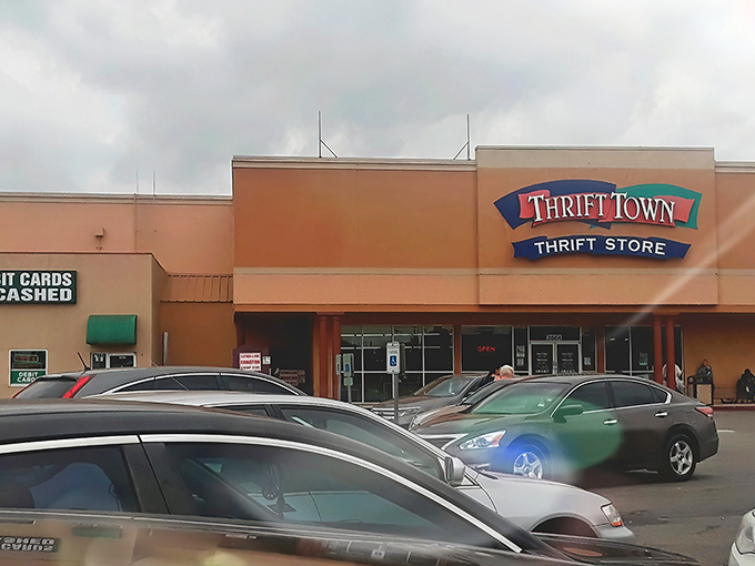 The unassuming exterior of Thrift Town belies the wonderland within, like a treasure chest disguised as a shoebox. Bargain magic awaits! 
