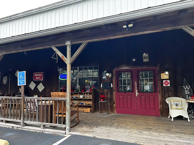 The unassuming exterior of Antique City Mall beckons with its rustic charm and iconic red door &ndash; Florida's time machine disguised as a country store.