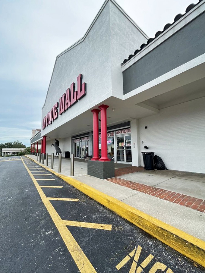 The unassuming exterior belies the wonderland within. Like finding a portal to the past, Wildwood Antique Mall's bold red sign beckons treasure hunters from miles around.