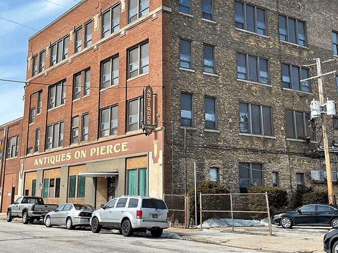 The brick fortress of forgotten treasures stands proudly on Pierce Street, a time capsule disguised as a building in Milwaukee's industrial district.