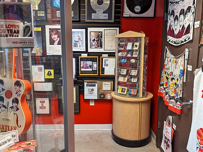 Peek through the window at Penny Lane and you'll spot treasures that would make any Beatles fan's heart skip a beat. The vibrant red walls set the perfect backdrop for Fab Four history.