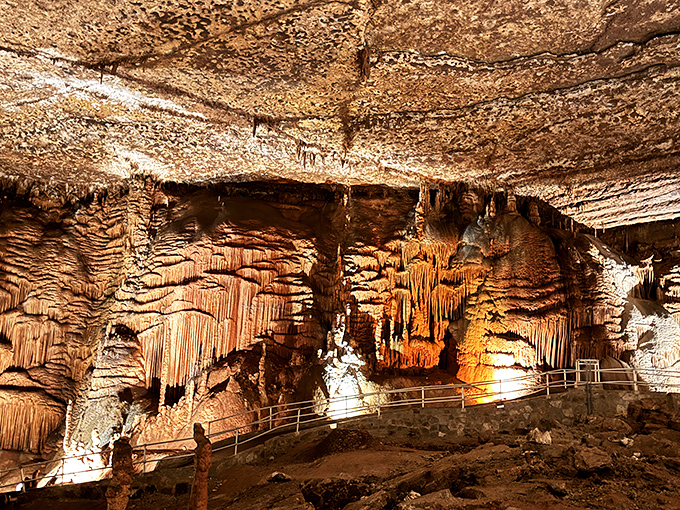 Nature's own light show illuminates this underground cathedral, where stalactites and stalagmites have been playing the world's slowest game of tag for millennia.