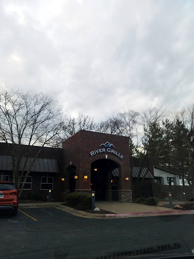 The brick fa&ccedil;ade of River Grille stands like a culinary fortress, promising treasures within that make the journey to Bentonville worthwhile.