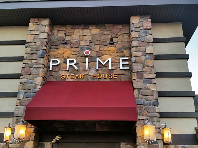 The stone facade of Prime Steak House welcomes hungry travelers with its distinctive red awning and warm lighting&mdash;a carnivore's lighthouse on the Bethlehem horizon.