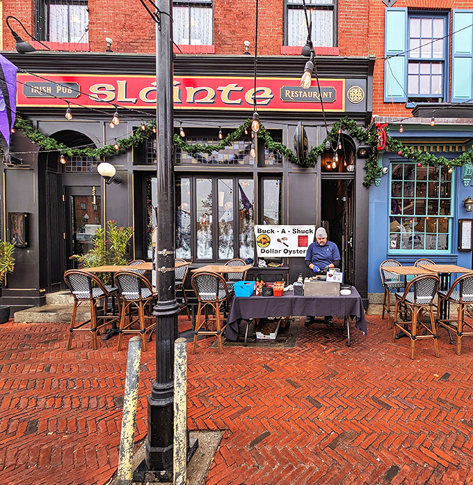 The crimson fa&ccedil;ade of Slainte stands proudly on Thames Street, Irish flag waving between American ones&mdash;a diplomatic sandwich of international goodwill.
