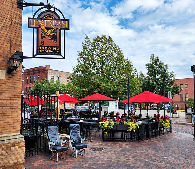 The historic brick fa&ccedil;ade of Upstream Brewing Company welcomes you to Omaha's Old Market district, where culinary magic awaits behind those wooden doors.