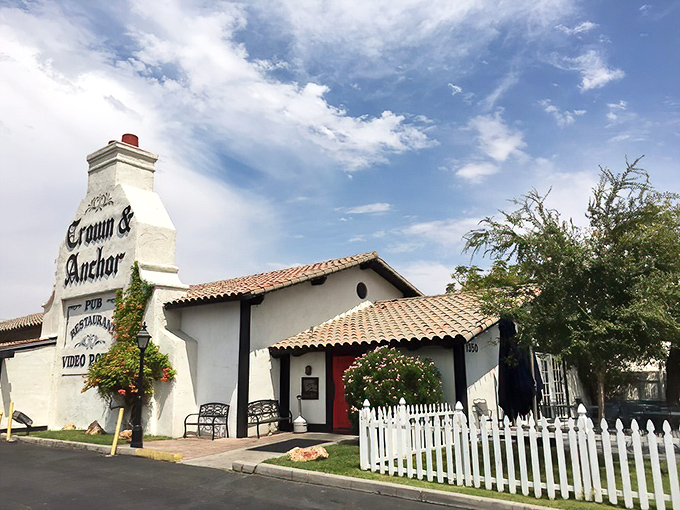 A slice of England in the desert! The Crown & Anchor's white-washed exterior and iconic London taxi promise authentic British charm just minutes from the Strip.