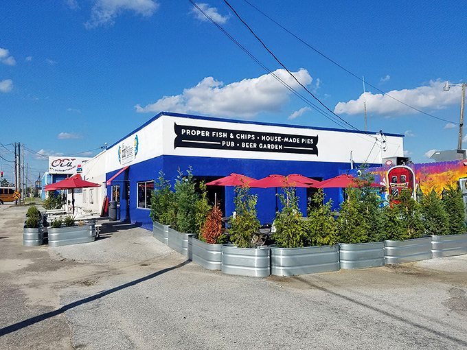 The bright blue exterior of The CODfather stands like a British embassy on American soil, complete with cartoon fish mascots making an offer you can't refuse.