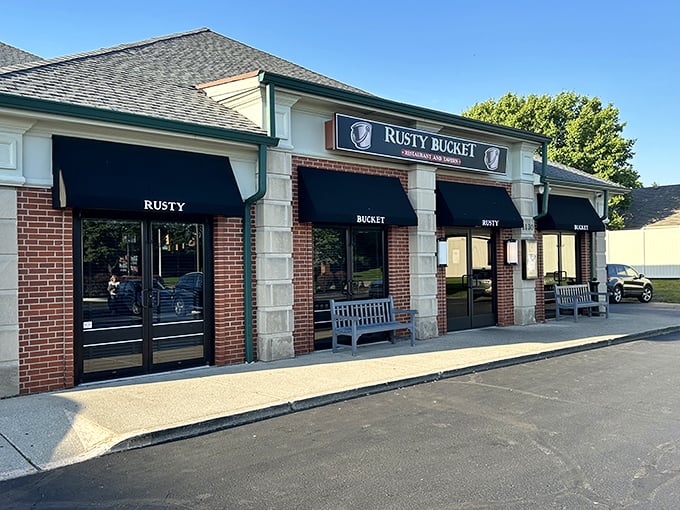 The unassuming exterior of Rusty Bucket belies the culinary treasures within. Like finding a vintage Rolex at a yard sale, this strip mall gem delivers unexpected delights.