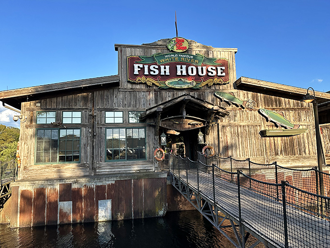 The rustic wooden exterior of White River Fish House beckons like an old friend, promising authentic Ozark flavors within its weathered walls.