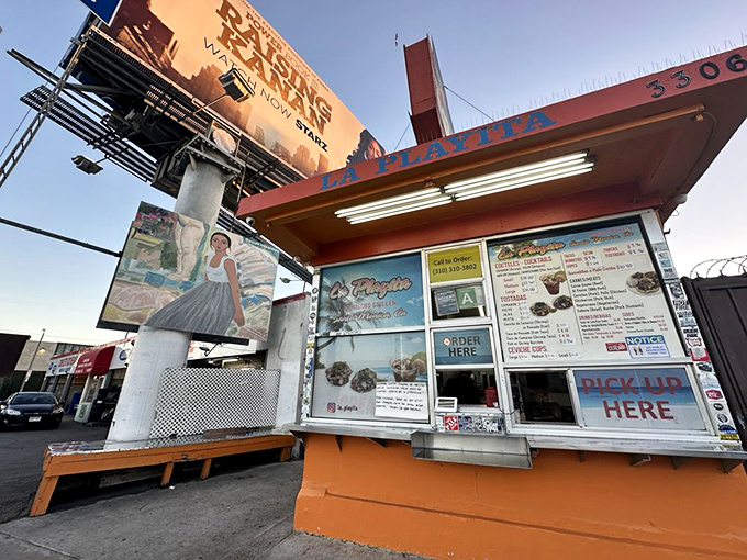 The humble orange facade of Mariscos Guillen La Playita stands like a seafood lighthouse on Lincoln Boulevard, beckoning hungry travelers with promises of oceanic treasures.