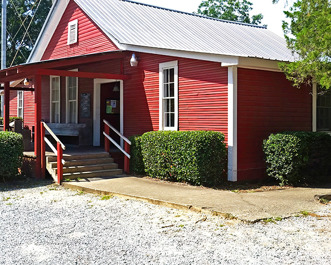 The little red schoolhouse that became a culinary institution stands proudly in Grady, complete with patriotic bunting and a gravel parking lot that's always full at lunchtime.