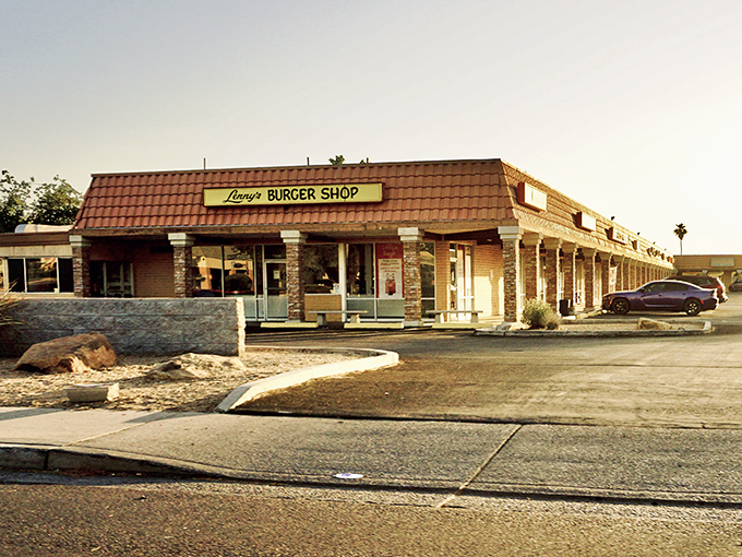 The unassuming terra cotta roof and bright yellow sign promise no frills, just thrills for your taste buds. Arizona's answer to burger paradise.