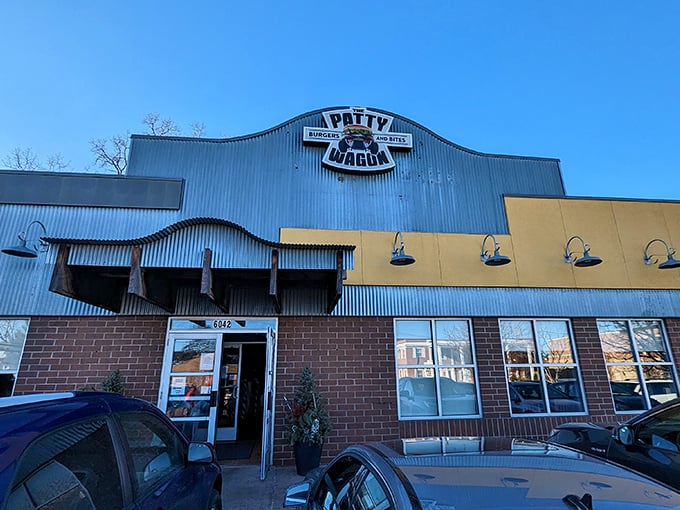 The yellow and gray exterior of The Patty Wagon stands like a beacon of comfort food hope in Minneapolis. No fancy frills, just delicious promises.