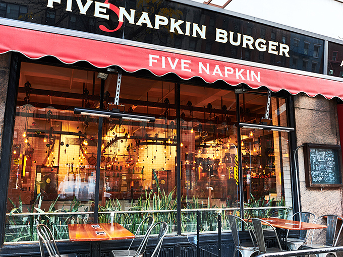 That iconic red awning is like a beacon for burger lovers navigating the urban jungle. Sidewalk seating beckons with prime people-watching possibilities.