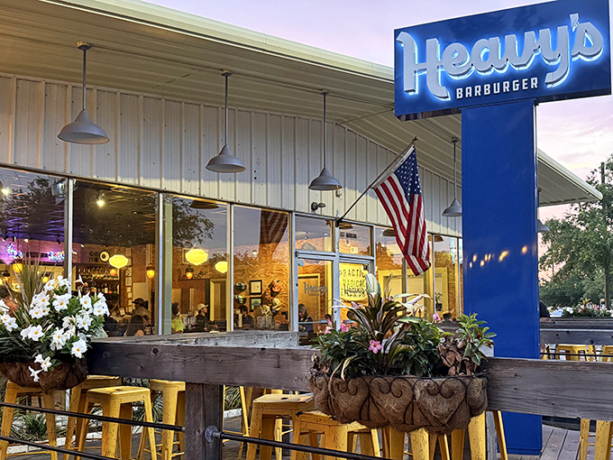 The blue sign beckons like a lighthouse for the hungry&mdash;Heavy's Barburger's unassuming exterior hides culinary treasures within.