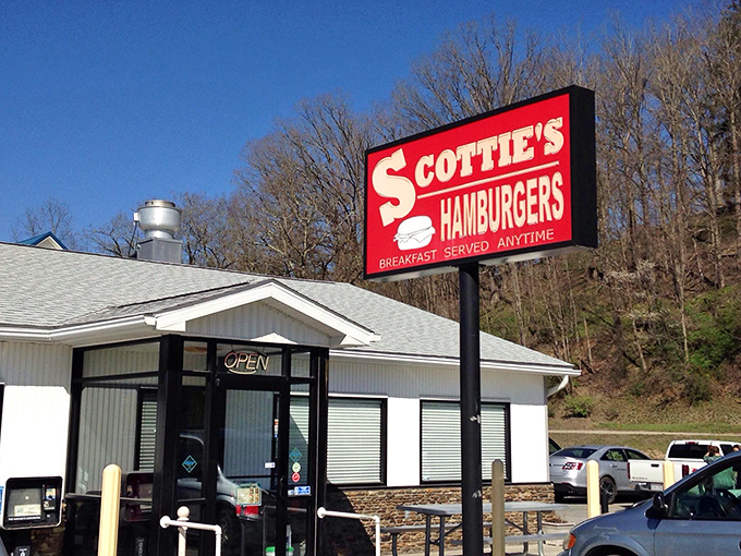 Simplicity speaks volumes at Scottie's exterior, where that iconic red sign promises hamburger heaven against West Virginia's rolling hills.