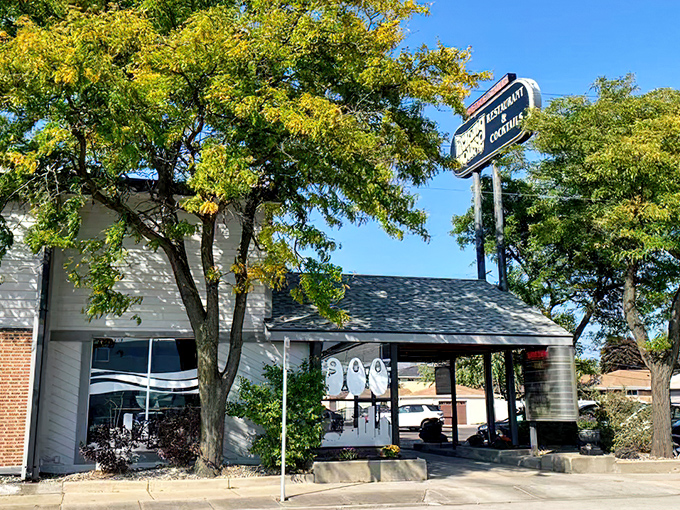 The iconic Packing House sign stands as a beacon for fish fry pilgrims, promising Milwaukee's favorite Friday tradition in neon-lit glory.