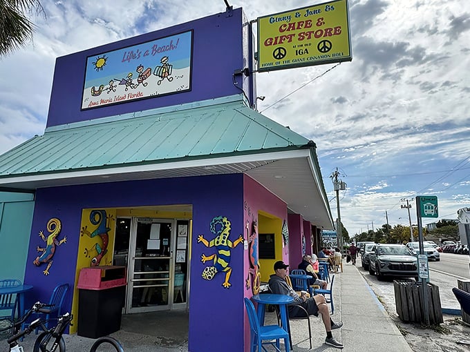 The turquoise beacon of breakfast bliss on Anna Maria Island beckons with its vibrant murals and promise of culinary treasures within. 