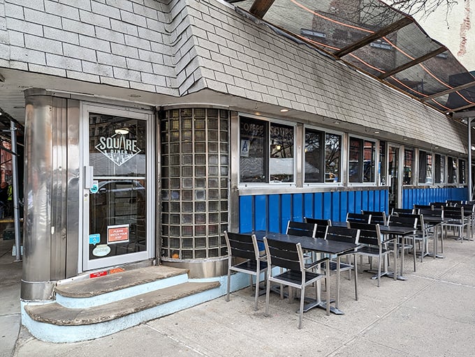 The iconic blue panels and stainless steel trim of Square Diner stand defiant against Tribeca's modernization, like your favorite uncle who refuses to upgrade his flip phone.