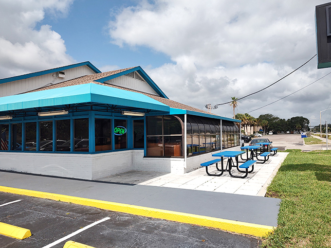 The bright turquoise exterior of My Island Pancake House stands out like a breakfast oasis in Rockledge, beckoning hungry travelers with promises of pancake paradise.