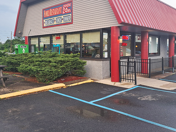 The neon glow of "OPEN 24 hrs" isn't just a sign&mdash;it's a beacon of hope for hungry souls at any hour. Classic diner architecture with a promise of comfort inside. 