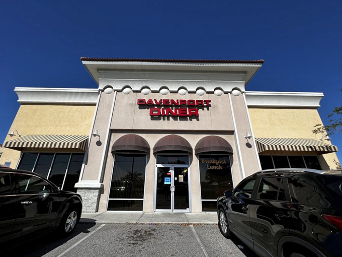 The unassuming white facade of Davenport Diner might fool you, but locals know this modest exterior hides culinary treasures worth discovering.