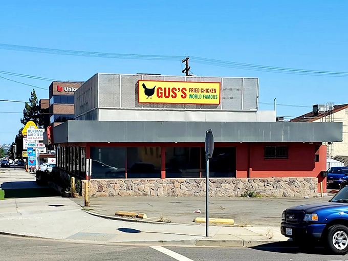 The coral-colored building with its bold yellow sign makes no apologies for its confidence. Like a Southern gentleman declaring his intentions, Gus's announces itself with charming audacity.