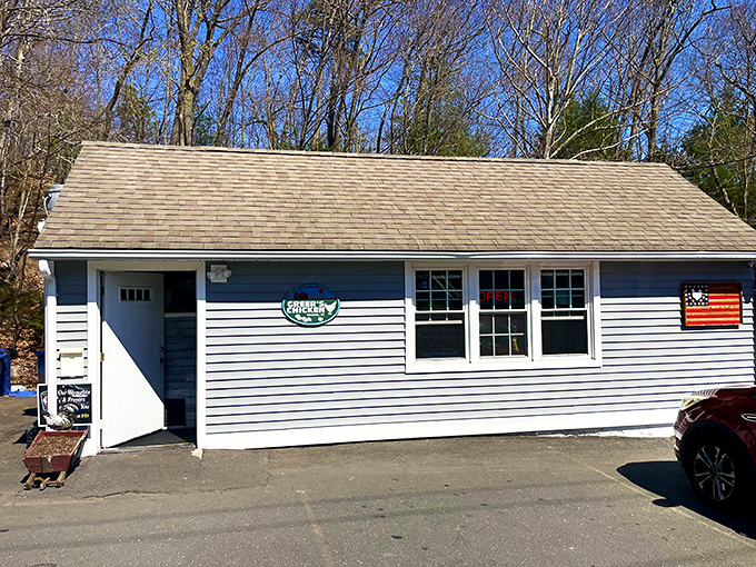 Rustic charm meets chicken paradise at Greer's, where this unassuming cabin in the Bristol woods houses some of Connecticut's most legendary fried chicken.