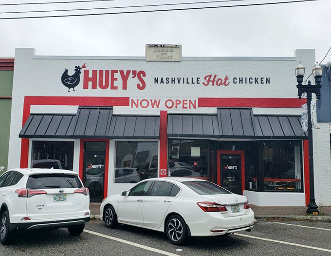 The red and white storefront announces its mission with unmistakable clarity: bringing Nashville's fiery poultry tradition to Jacksonville's hungry masses.