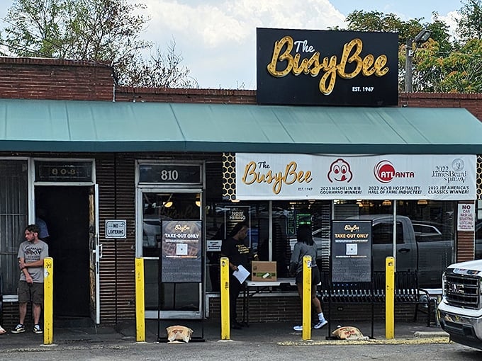The unassuming storefront that's launched a thousand food pilgrimages. Atlanta's culinary landmark stands proudly on MLK Drive, yellow poles standing guard like sentinels of soul food.