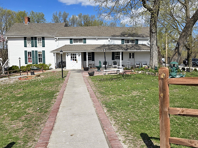 Home is where the chicken is! This inviting farmhouse exterior beckons hungry pilgrims on their quest for legendary pan-fried perfection.