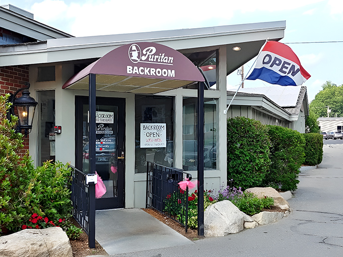 The unassuming entrance to the Puritan Backroom belies the culinary treasures within. Like finding a secret door to comfort food paradise.