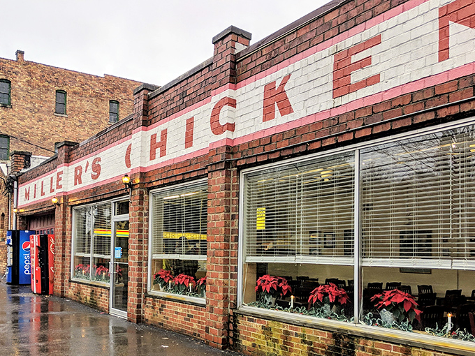 The brick facade of Miller's Chicken stands like a humble temple to fried poultry perfection, its simple sign promising delicious treasures within.