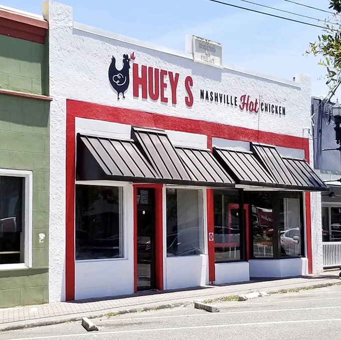 The red and white storefront announces its mission with unmistakable clarity: bringing Nashville's fiery poultry tradition to Jacksonville's hungry masses.