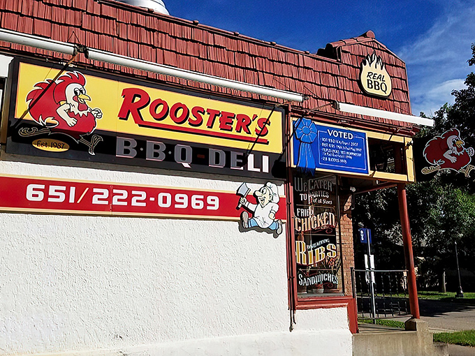 The iconic red exterior of Rooster's BBQ Deli stands like a beacon to hungry Minnesotans, complete with its blue ribbon of approval and cartoon mascot.