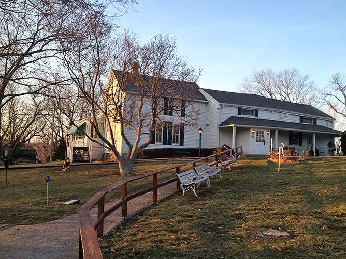 Home is where the chicken is! This inviting farmhouse exterior beckons hungry pilgrims on their quest for legendary pan-fried perfection.